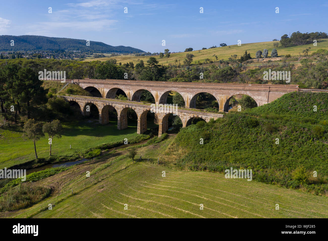 An old train viaduct in the countryside Stock Photo - Alamy