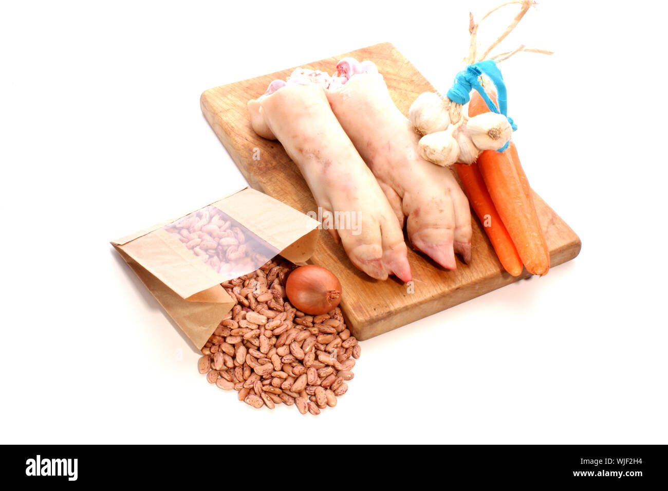 pig trotter and fresh vegetables to make bean soup Stock Photo - Alamy