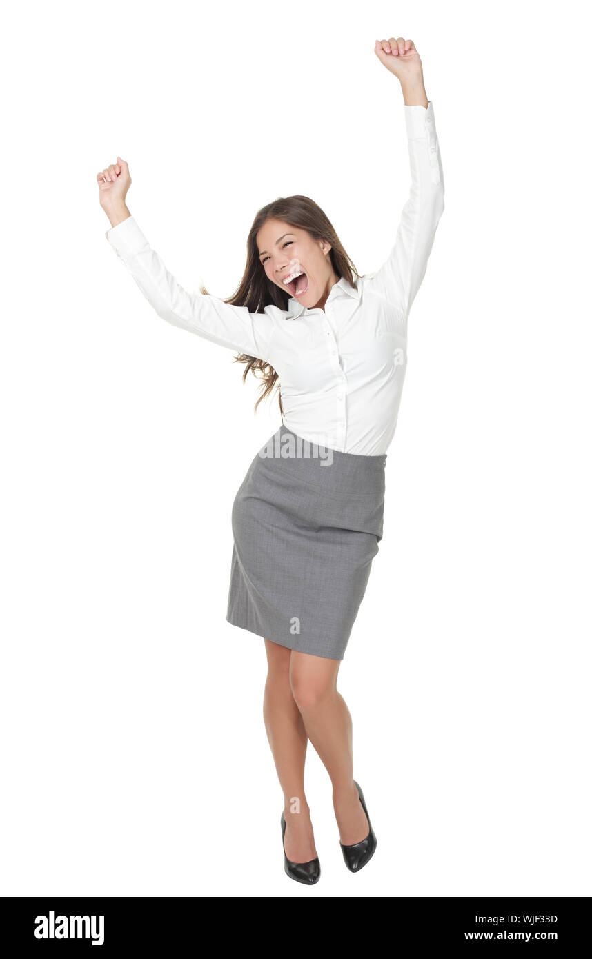 Success woman celebrating in winner dance. Casual young successful ...