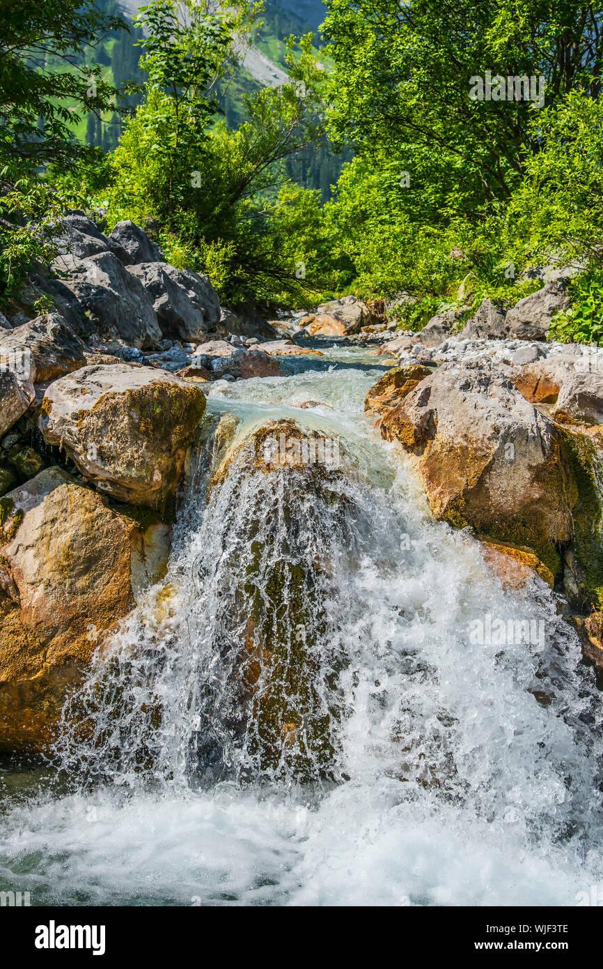Image of a waterfall in Austrian Alps in summer Stock Photo - Alamy