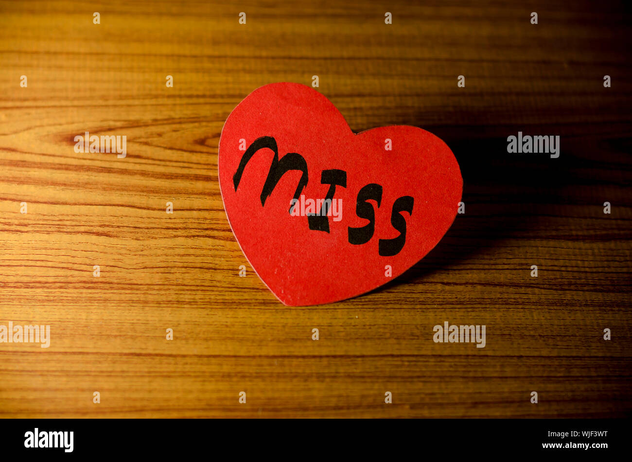 red heart word miss on wood vintage stlye background Stock Photo - Alamy