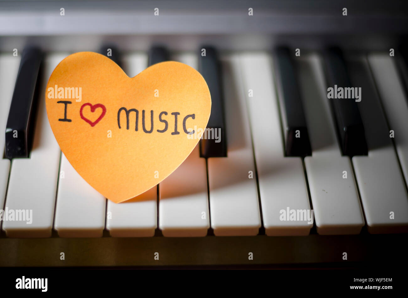 heart on key piano say love music Stock Photo - Alamy