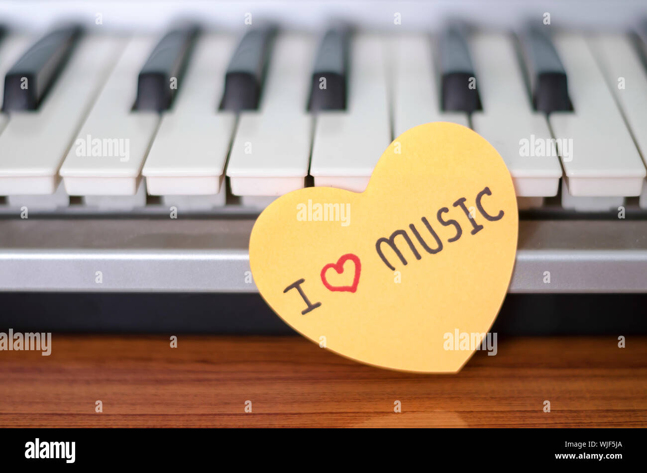 heart on key piano say love music Stock Photo - Alamy