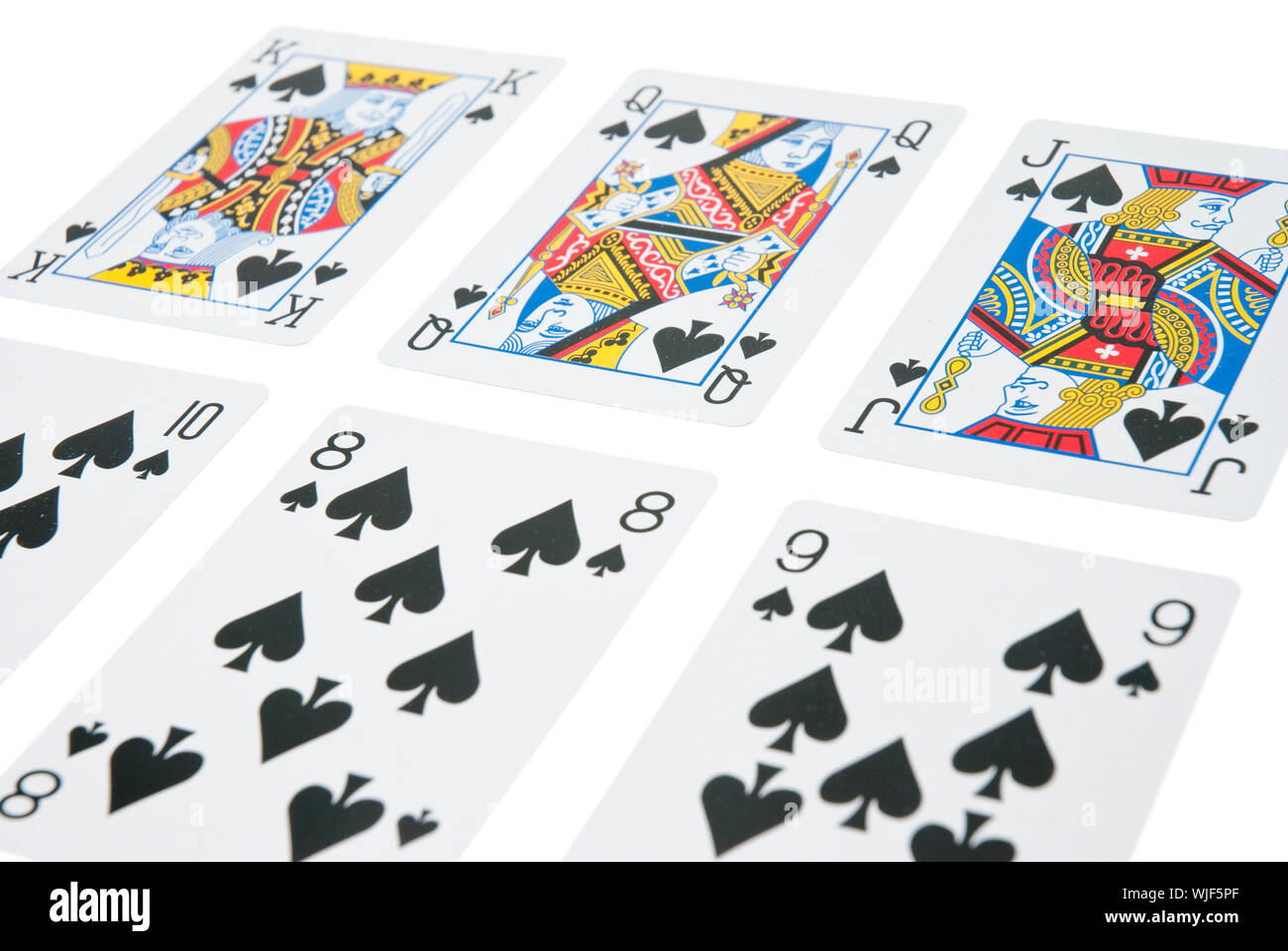 Playing cards isolated on a white background Stock Photo - Alamy