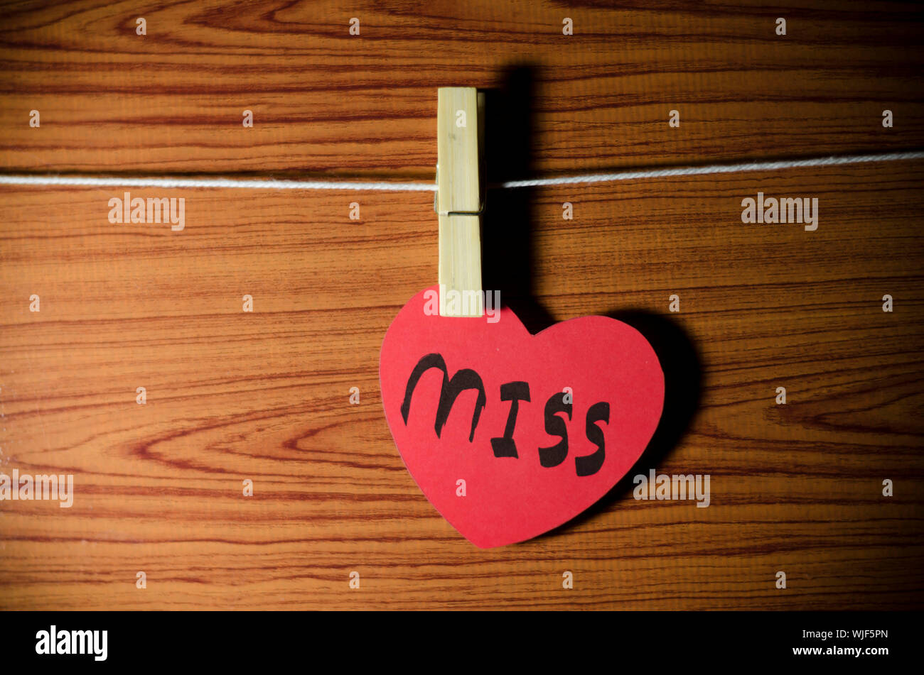 red heart word miss on wood vintage stlye background Stock Photo - Alamy