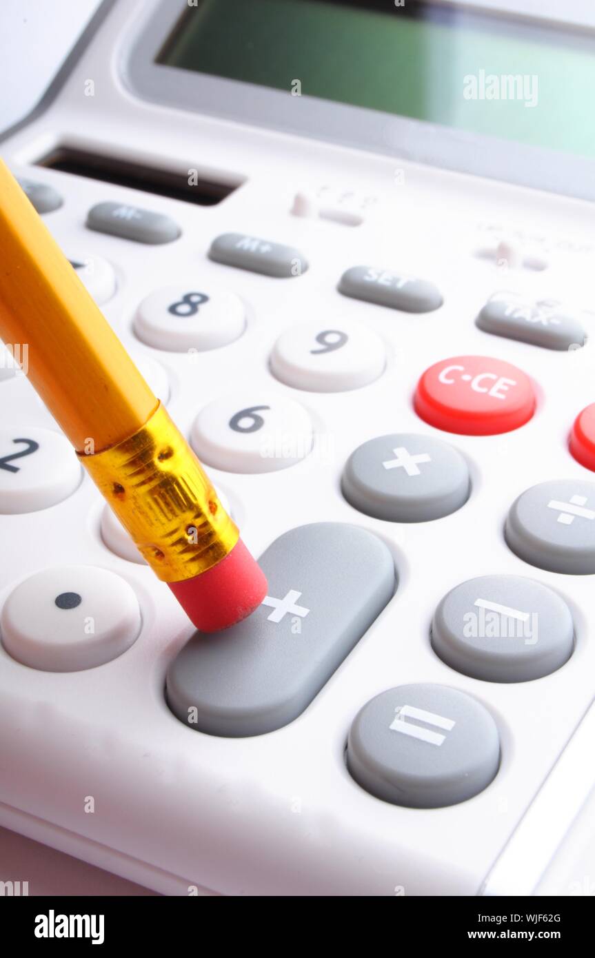business calculation concept with modern white calculator Stock Photo ...