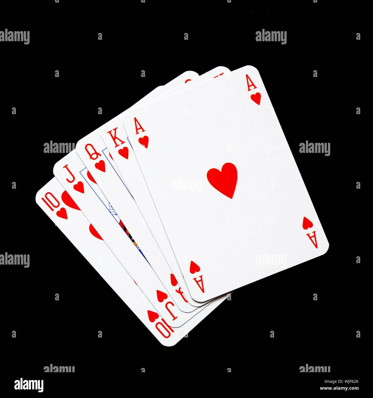 winning concept with four aces on black background Stock Photo - Alamy