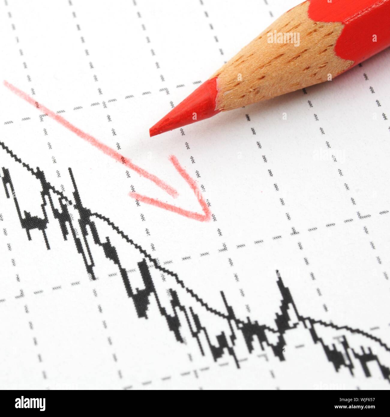 free fall of the stock market concept with red pen and business chart ...