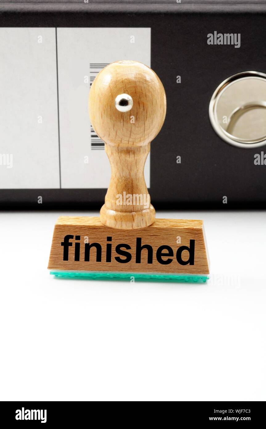 finished on stamp showing end or completed concept Stock Photo - Alamy