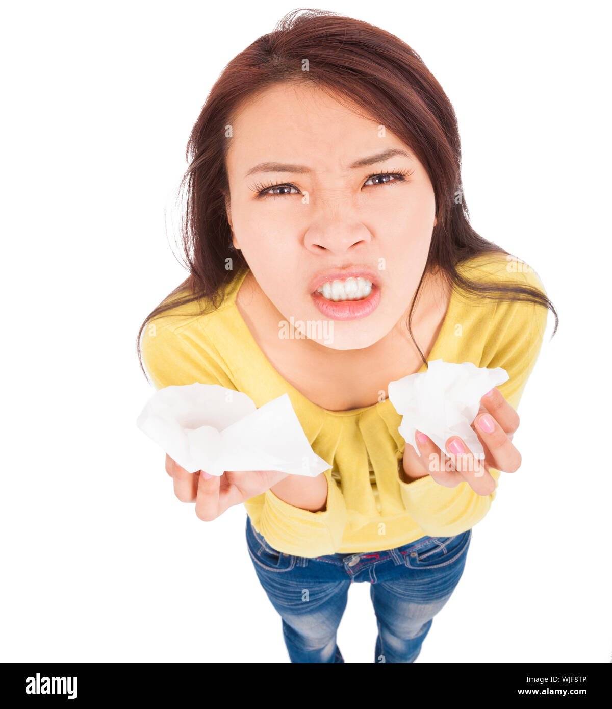 young woman holding tissue with painful face Stock Photo - Alamy