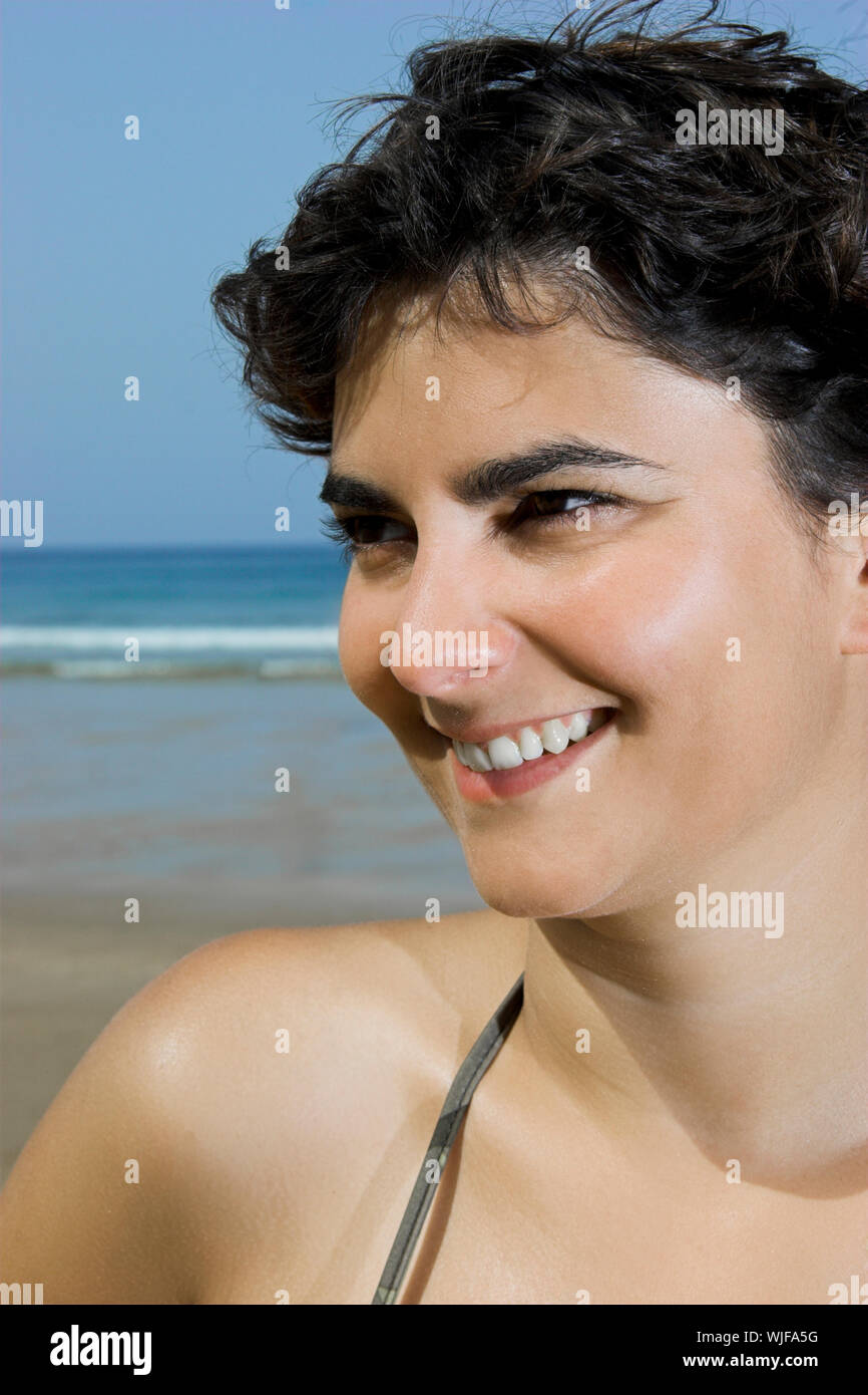 Outdoor portrait of a woman on the beach Stock Photo - Alamy
