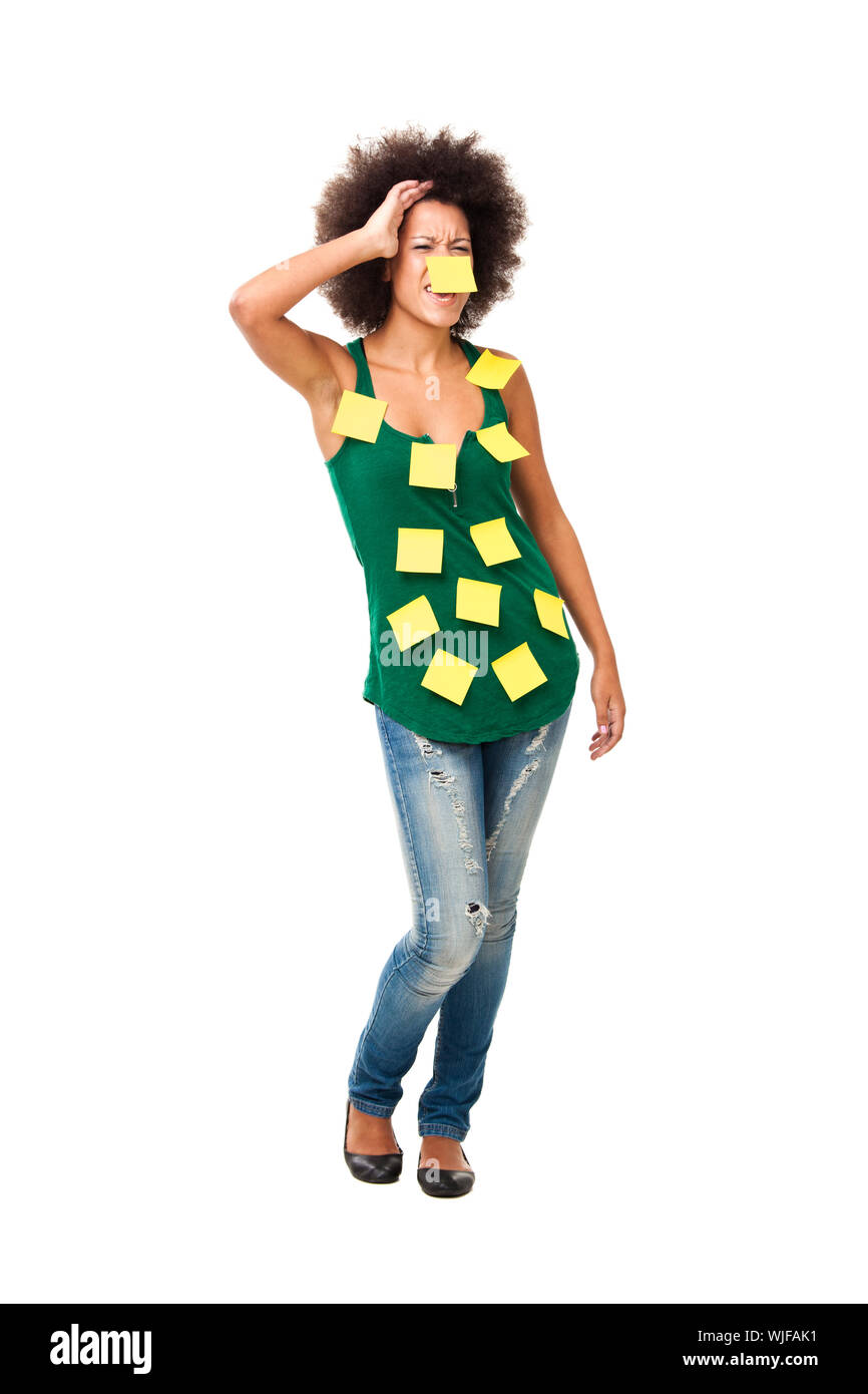 Beautiful young woman covered with post it notes all over the body ...