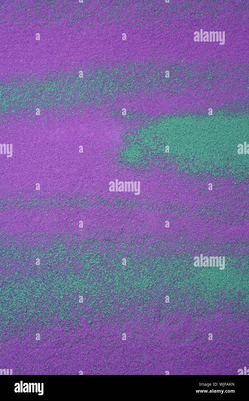 colorful pigments background textures in green and purple salt sand ...
