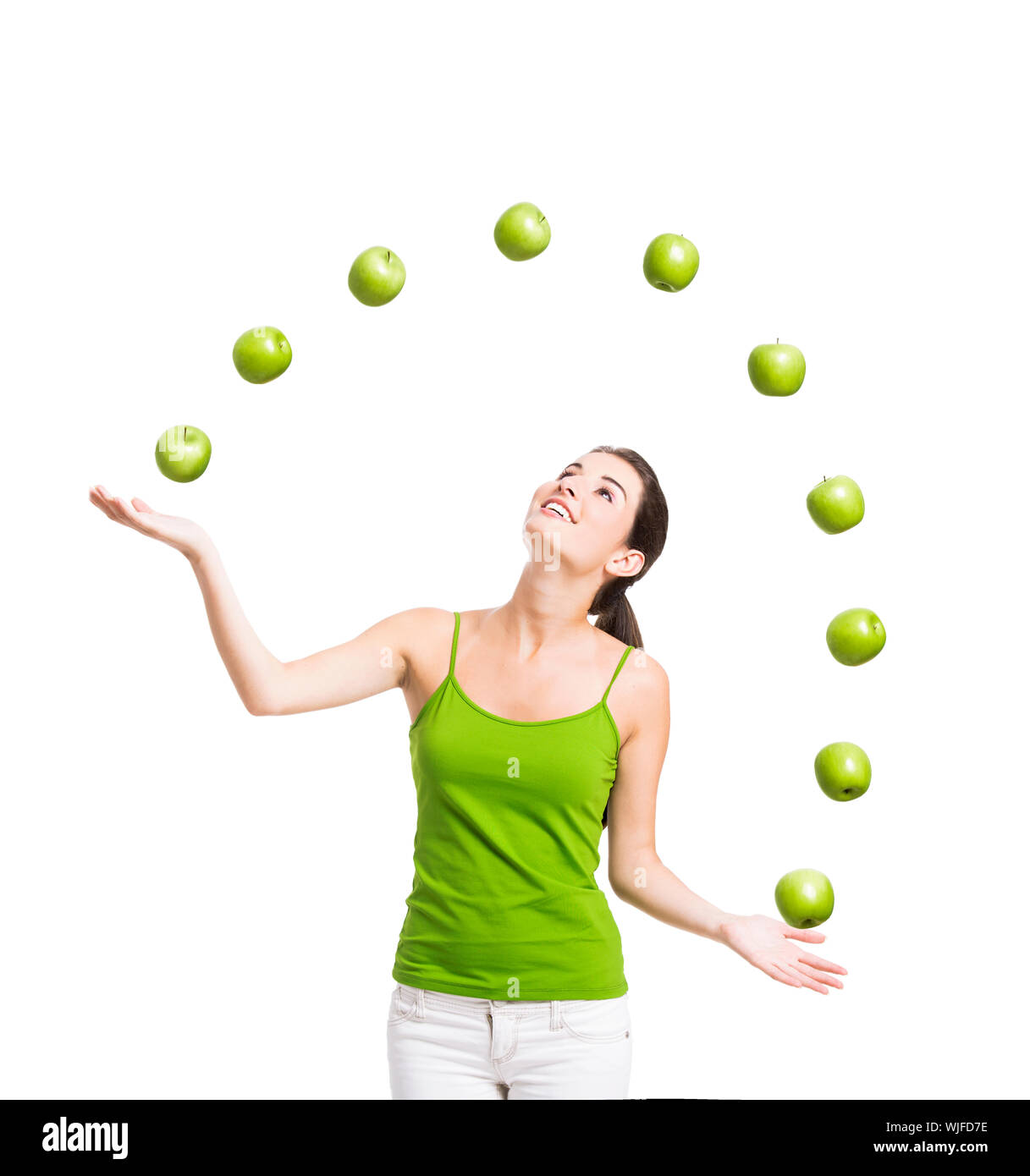 Healthy woman throwing apples, isolated over a white background Stock ...