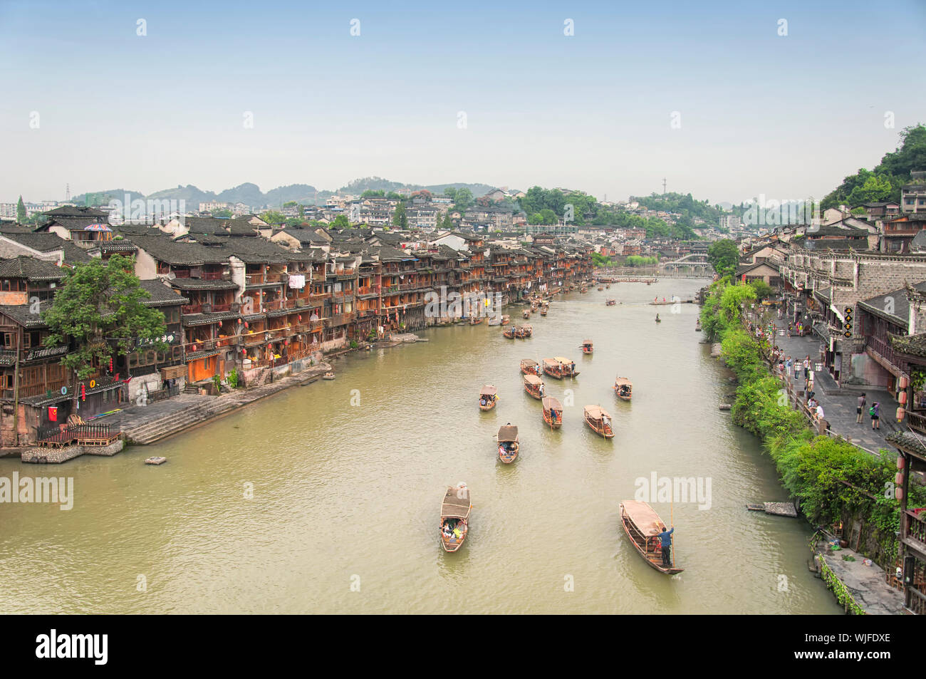 Fenghuang, China. September 13, 2015. Tourist boat traveling enmasse on ...