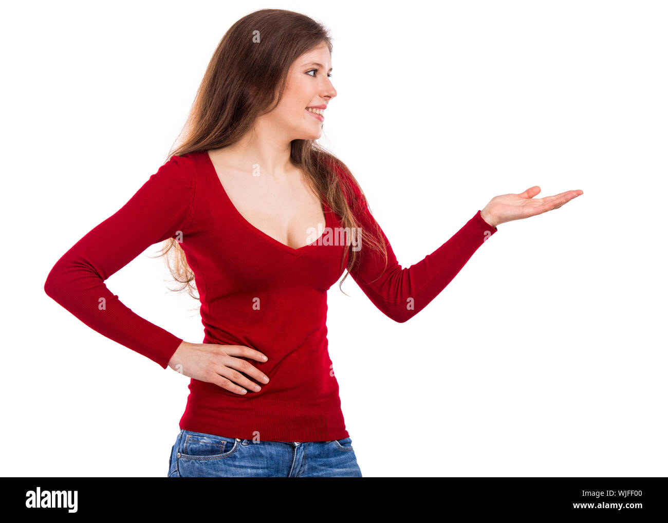 Beautiful young woman presenting something, isolated over white ...