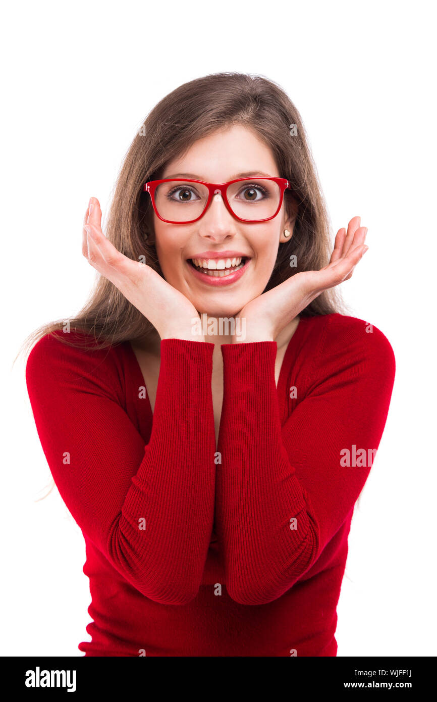 Beautiful woman smiling with a funny face, isolated over white ...