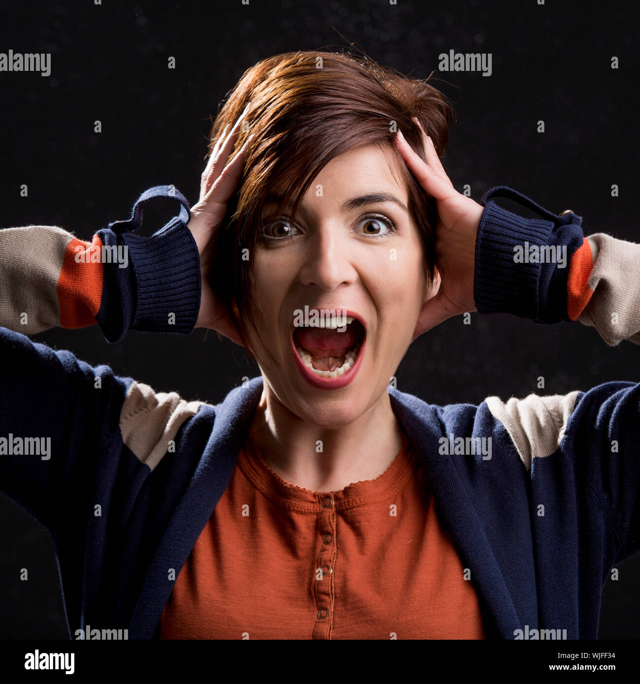 Happy yelling short hair hi-res stock photography and images - Alamy