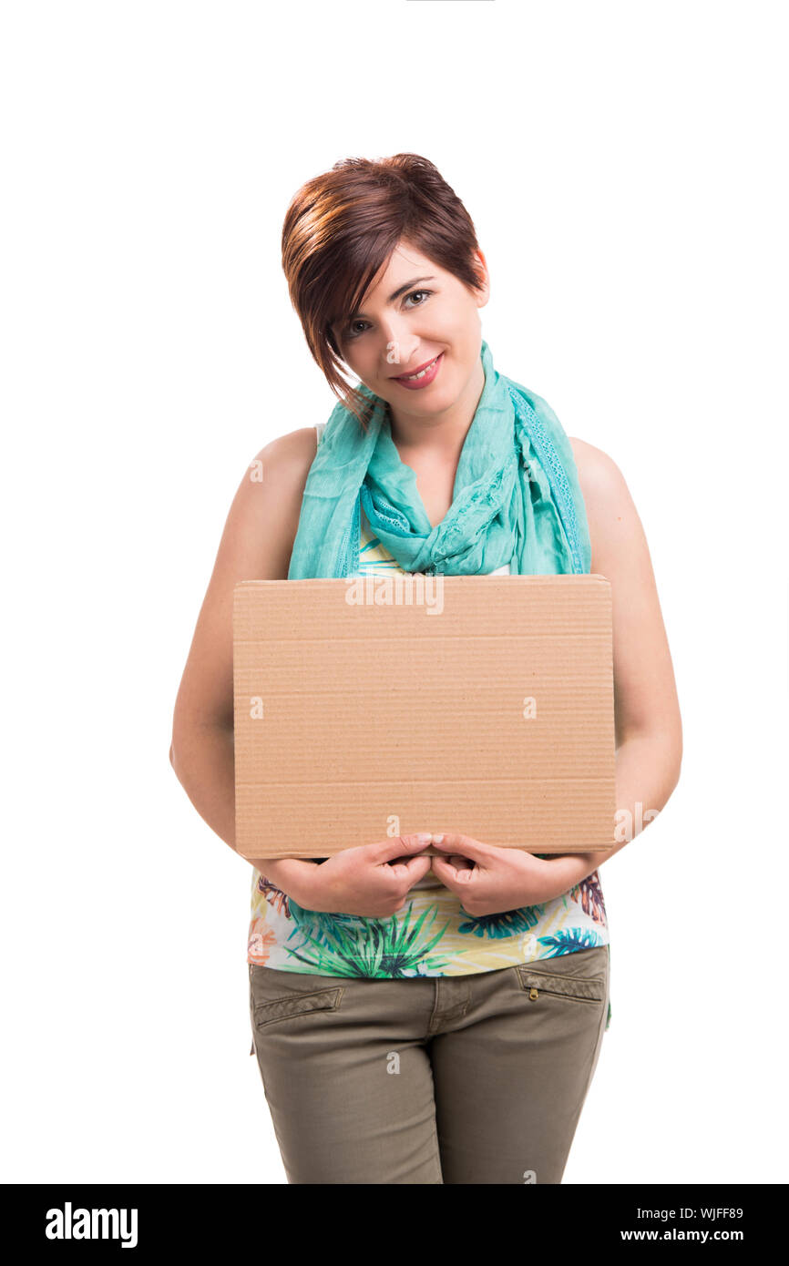Beautiful and happy woman holding a cardboard, isolated over a white ...