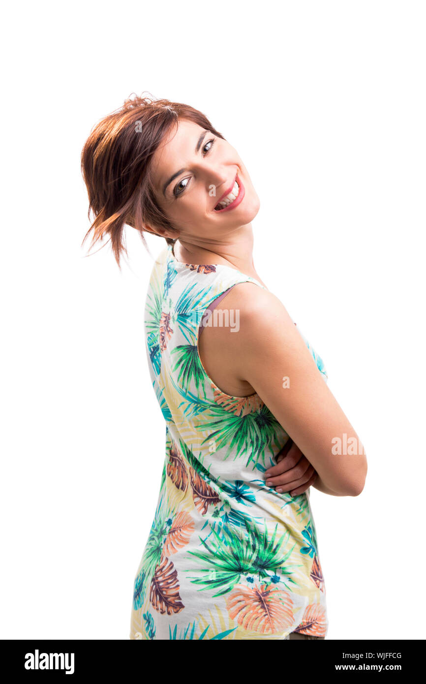 Portrait of a beautiful woman looking back and smiling, isolated over a ...