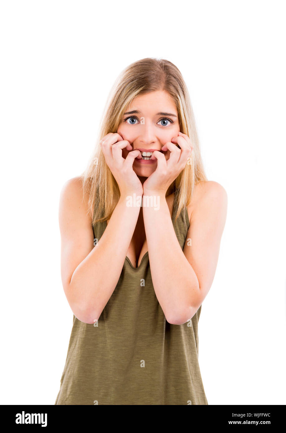 Beautiful blonde woman with a fear expression, isolated over white ...
