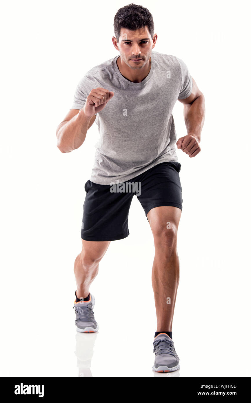 An athletic man running, isolated over a white background Stock Photo ...