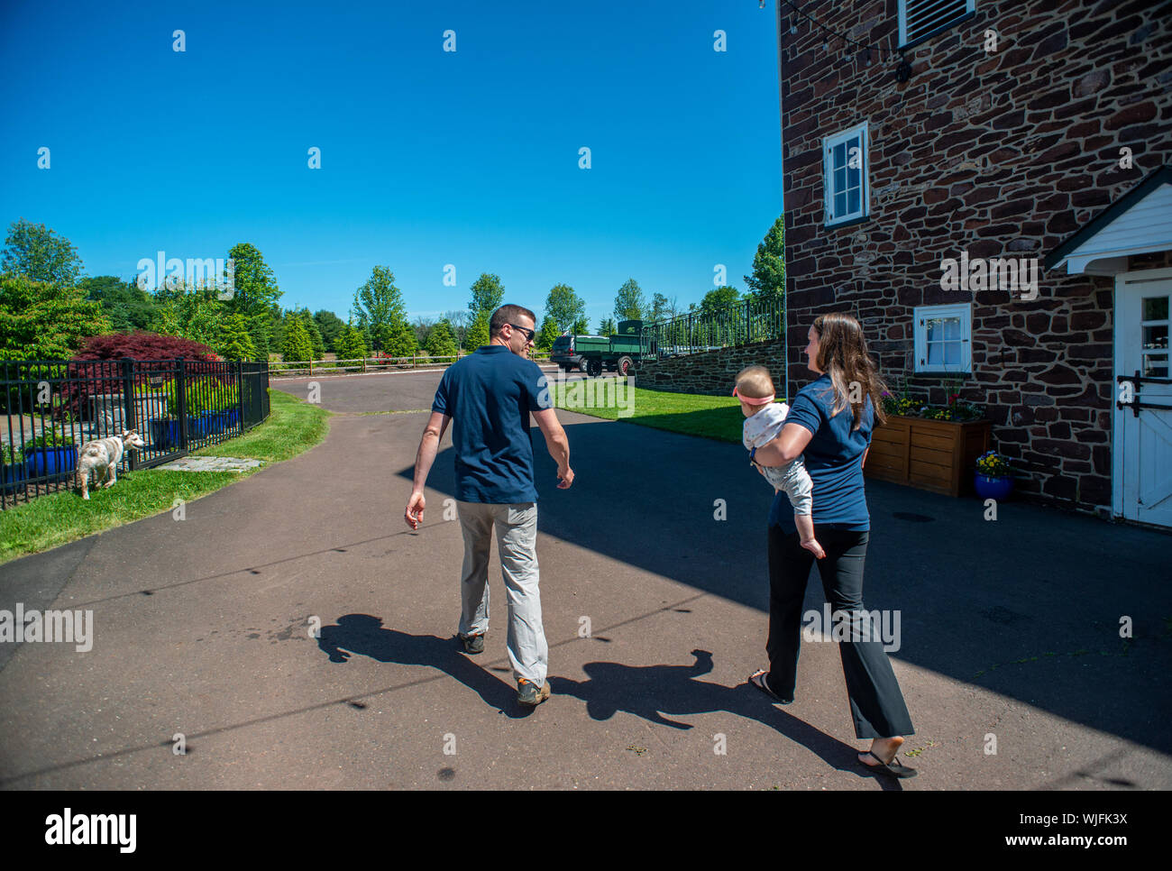 Kevin Roberts (left), walks with his wife Elizabeth Roberts (right ...