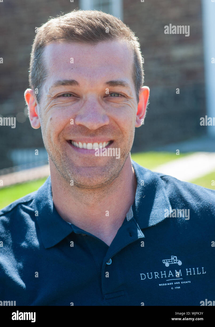 Kevin Roberts, drives an old antique truck in front of the barn at his ...