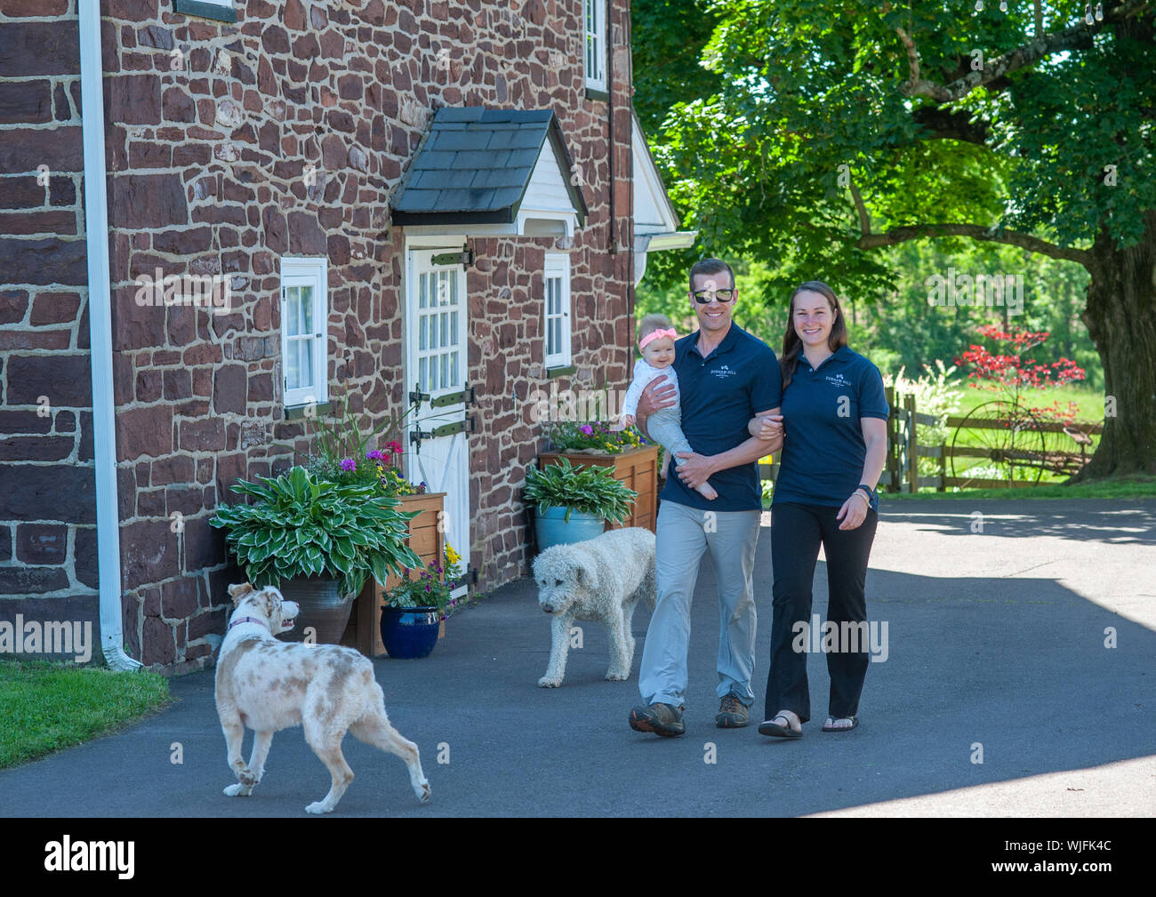 Kevin Roberts (center), walks with his wife Elizabeth Roberts (right ...