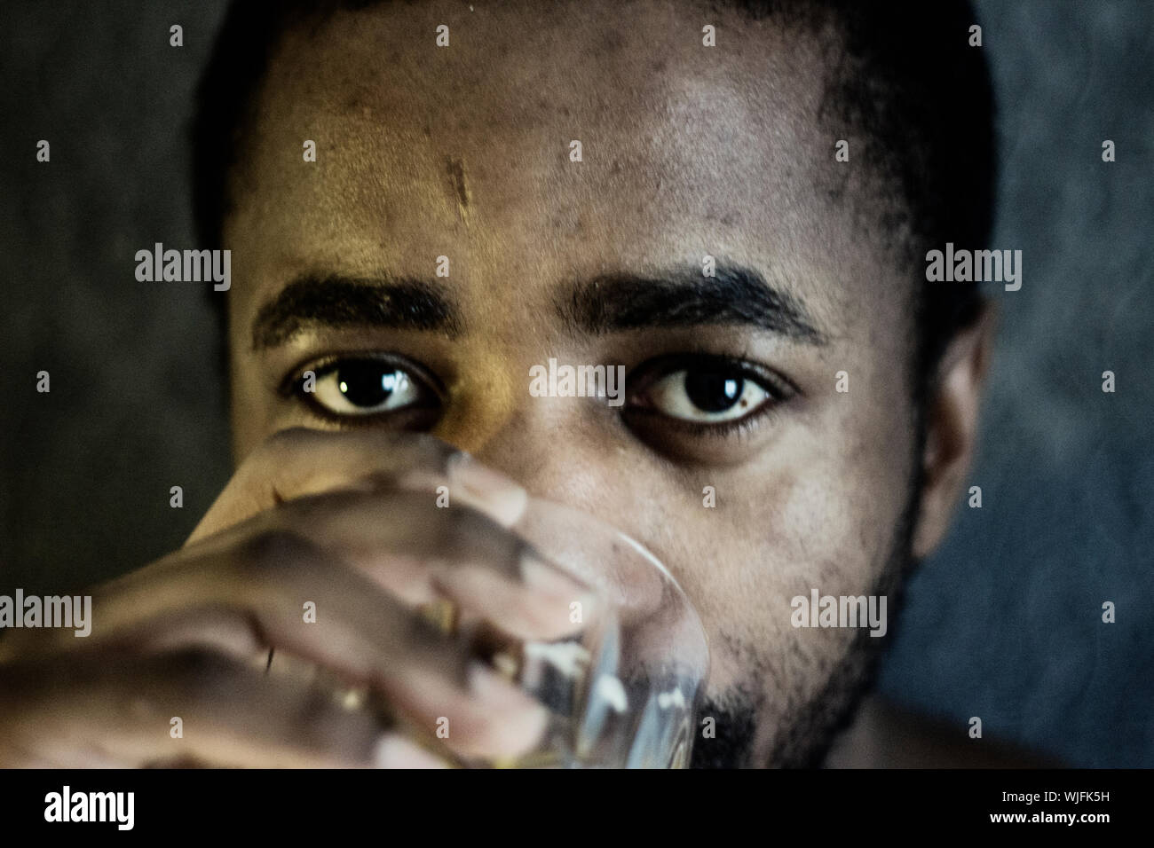 Man drinking glass water hi-res stock photography and images - Alamy