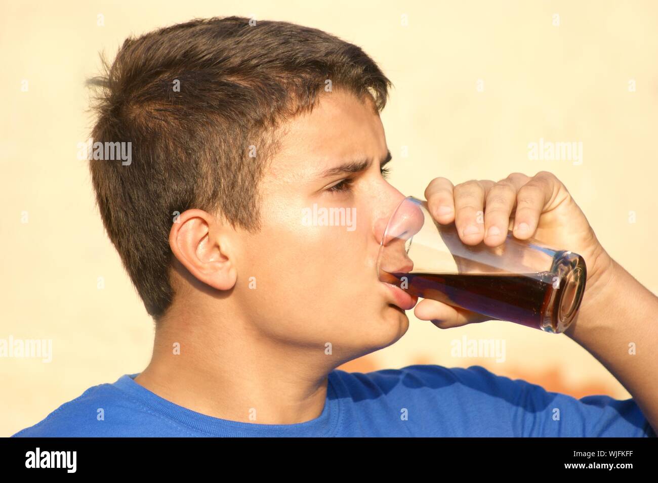 Boy drinking coke hi-res stock photography and images - Alamy