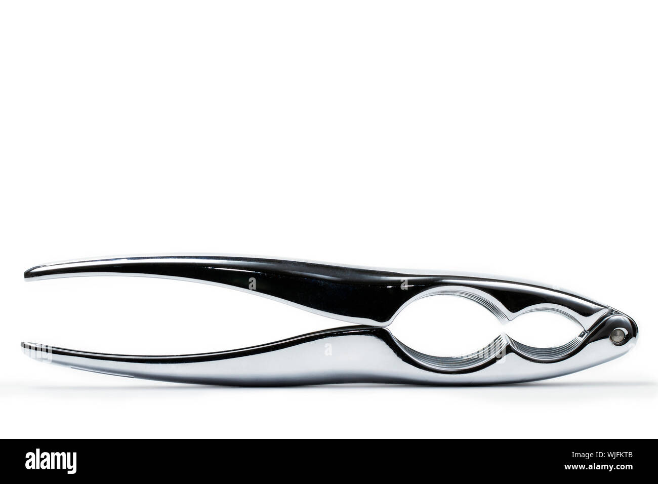 shiny silver nutcracker on white background Stock Photo - Alamy