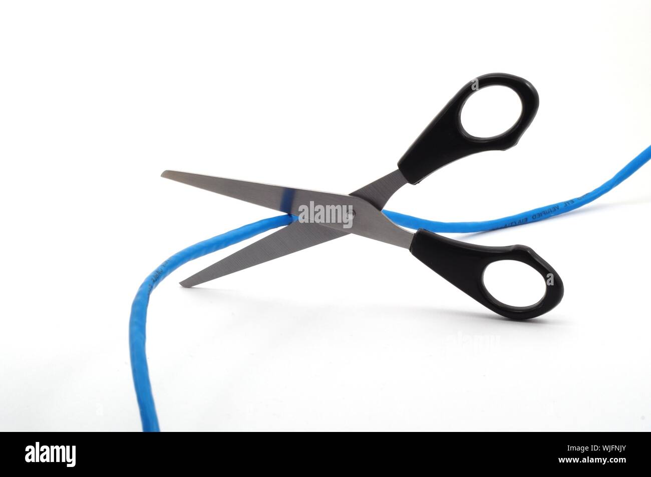 network cable and scissors isolated on white background Stock Photo - Alamy