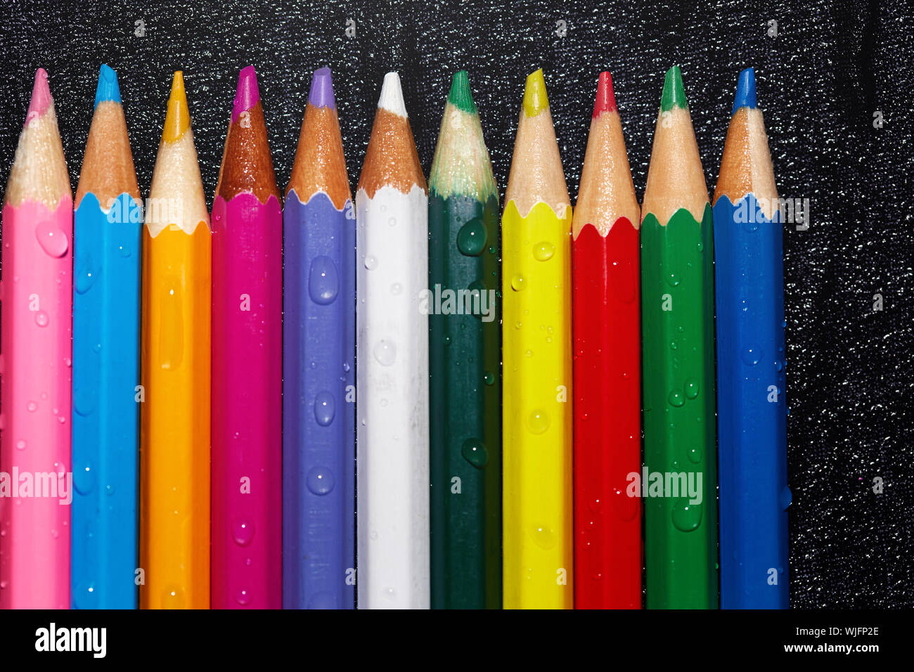 Set of wet crayons. Close-up view Stock Photo - Alamy