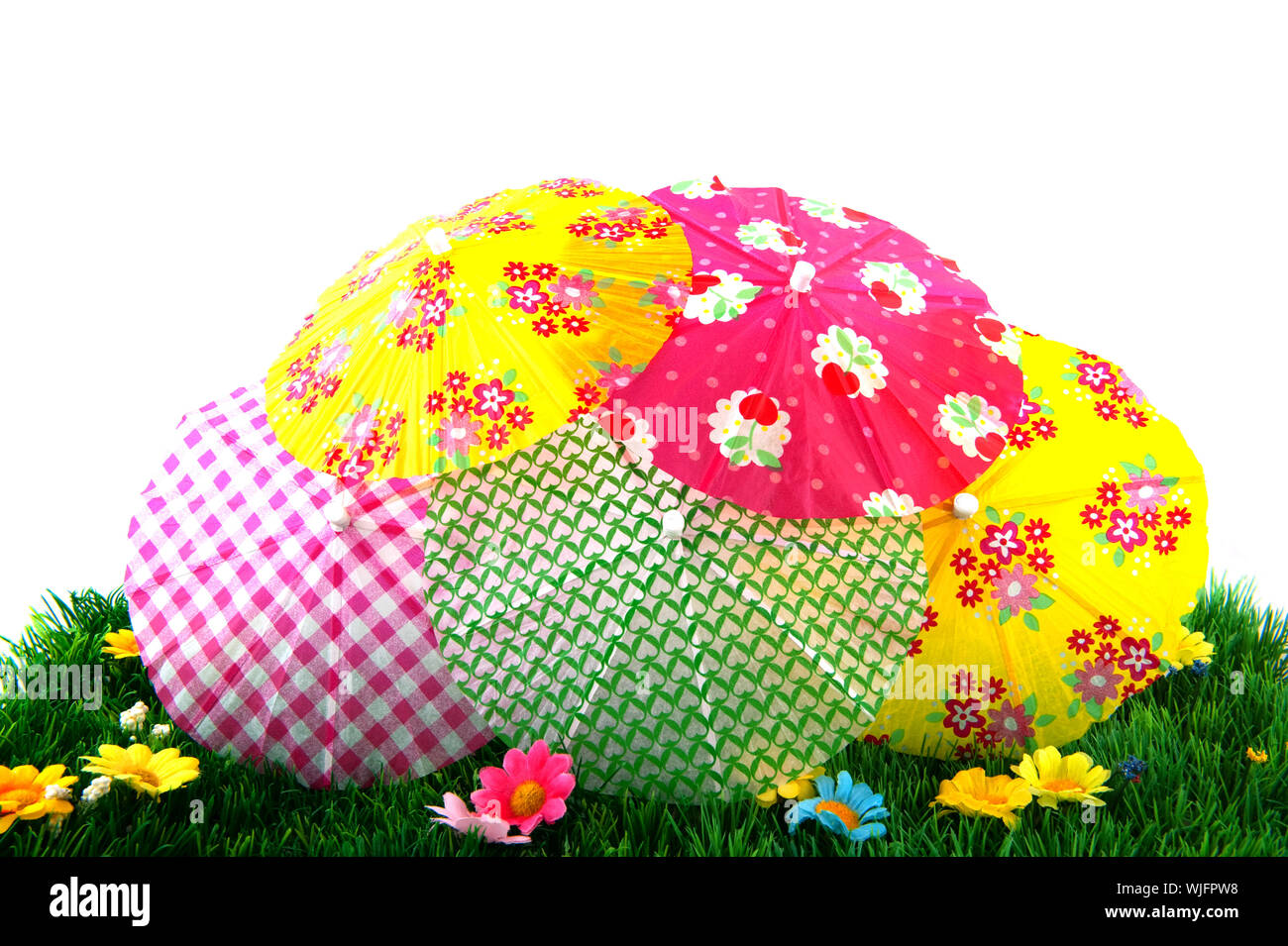 colorful parasols in the grass with summer flowers Stock Photo - Alamy