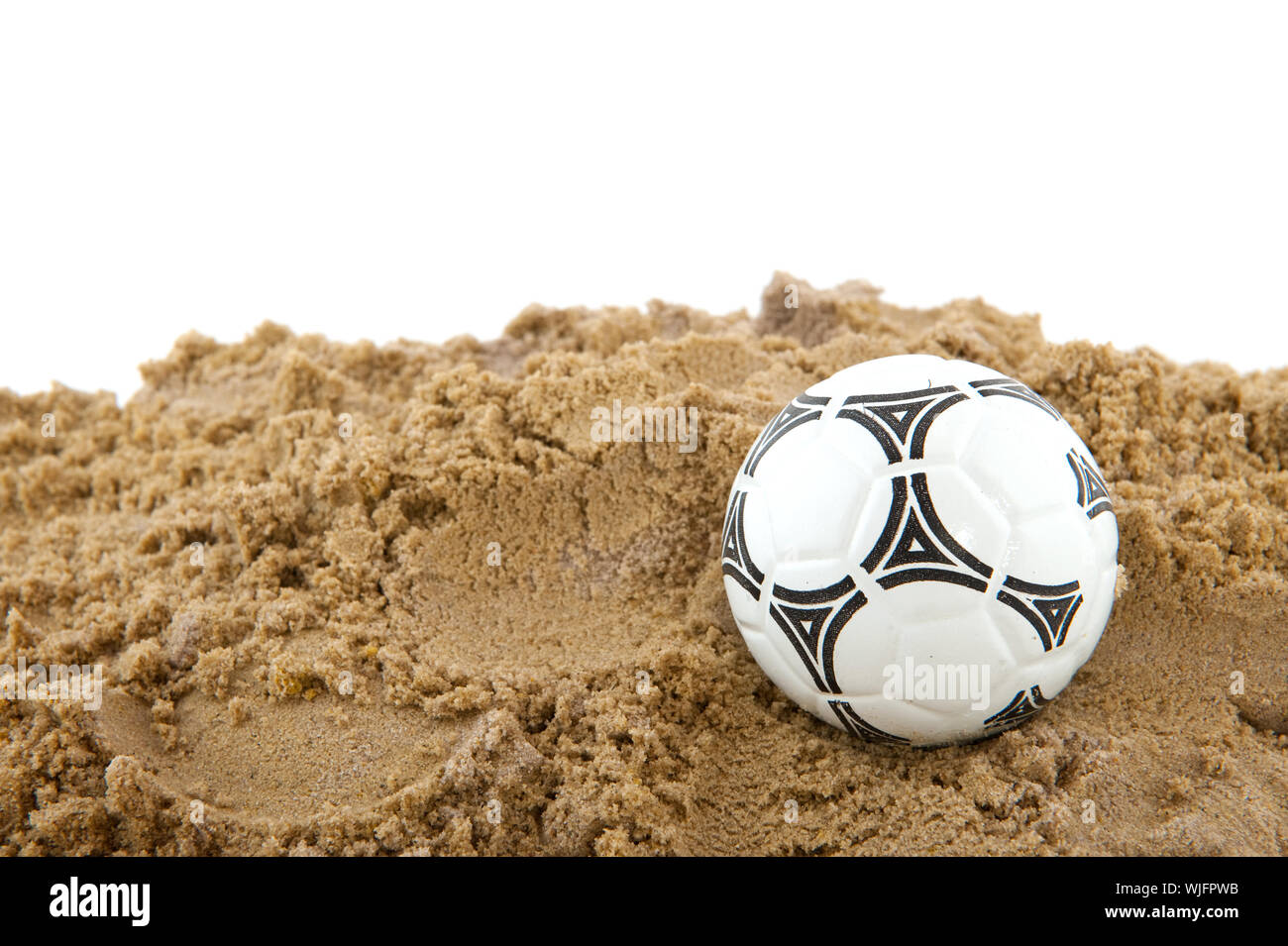 ball in the sand at the beach Stock Photo - Alamy
