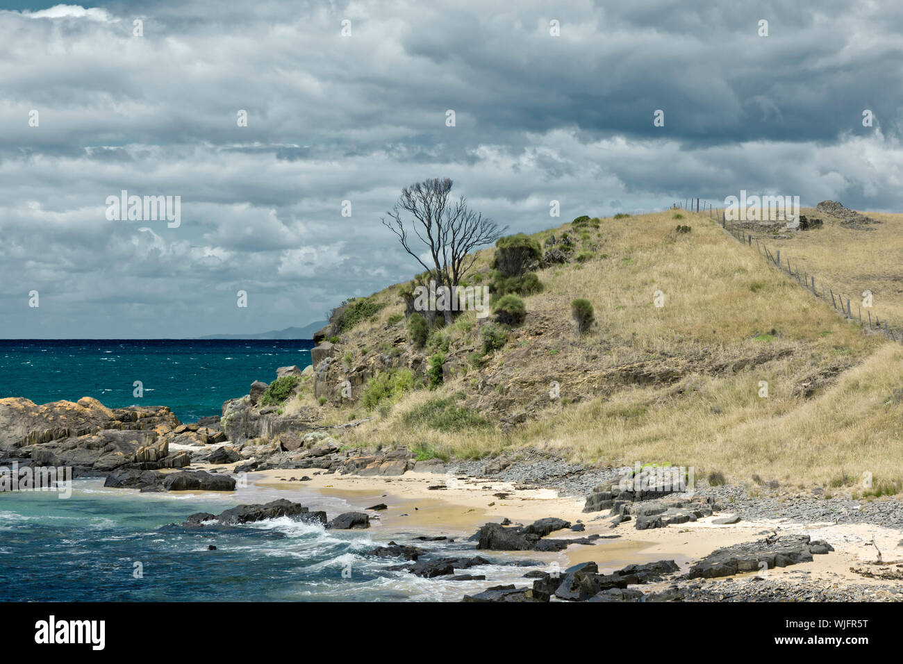 An image of the australian coast with rock, sand and the sea Stock ...