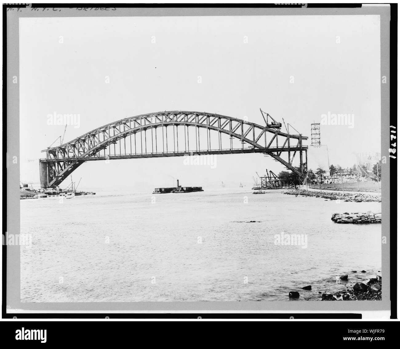 Hell Gate Bridge being constructed, New York City Stock Photo - Alamy