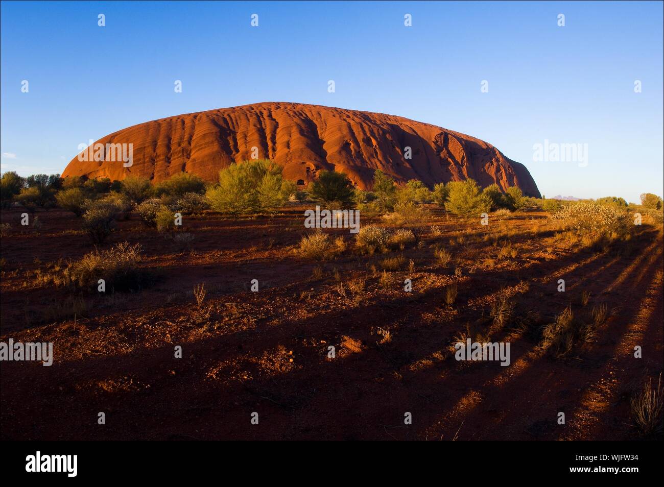 Uluru monolith in sun hi-res stock photography and images - Alamy