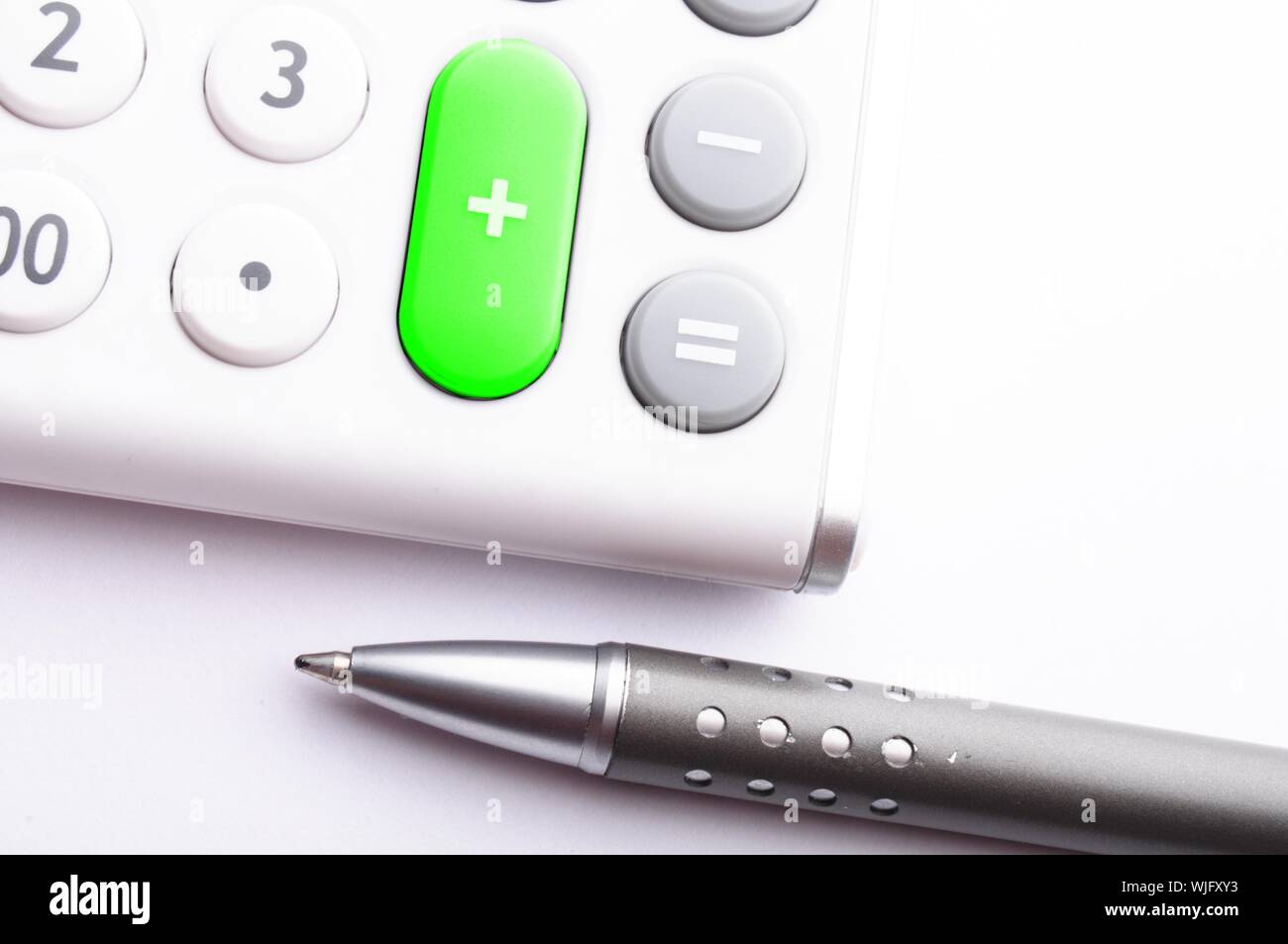 accounting concept with calculator and pen in business office Stock ...