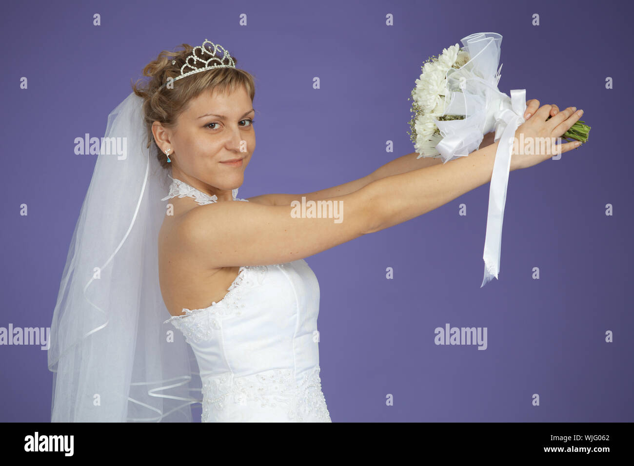 The bride is holding a wedding bouquet Stock Photo - Alamy