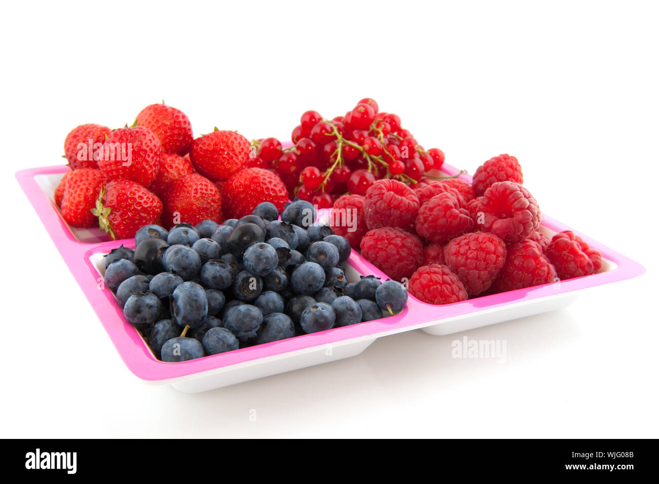 assortment fresh soft fruit in divided bowl Stock Photo - Alamy