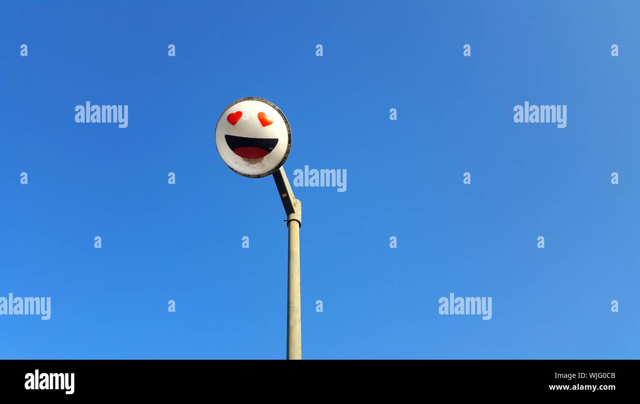 Smiley face blue hi-res stock photography and images - Alamy