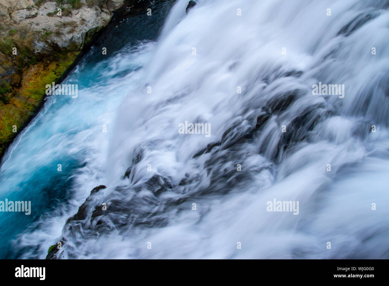 Small rivers with stones in long exposure Stock Photo - Alamy