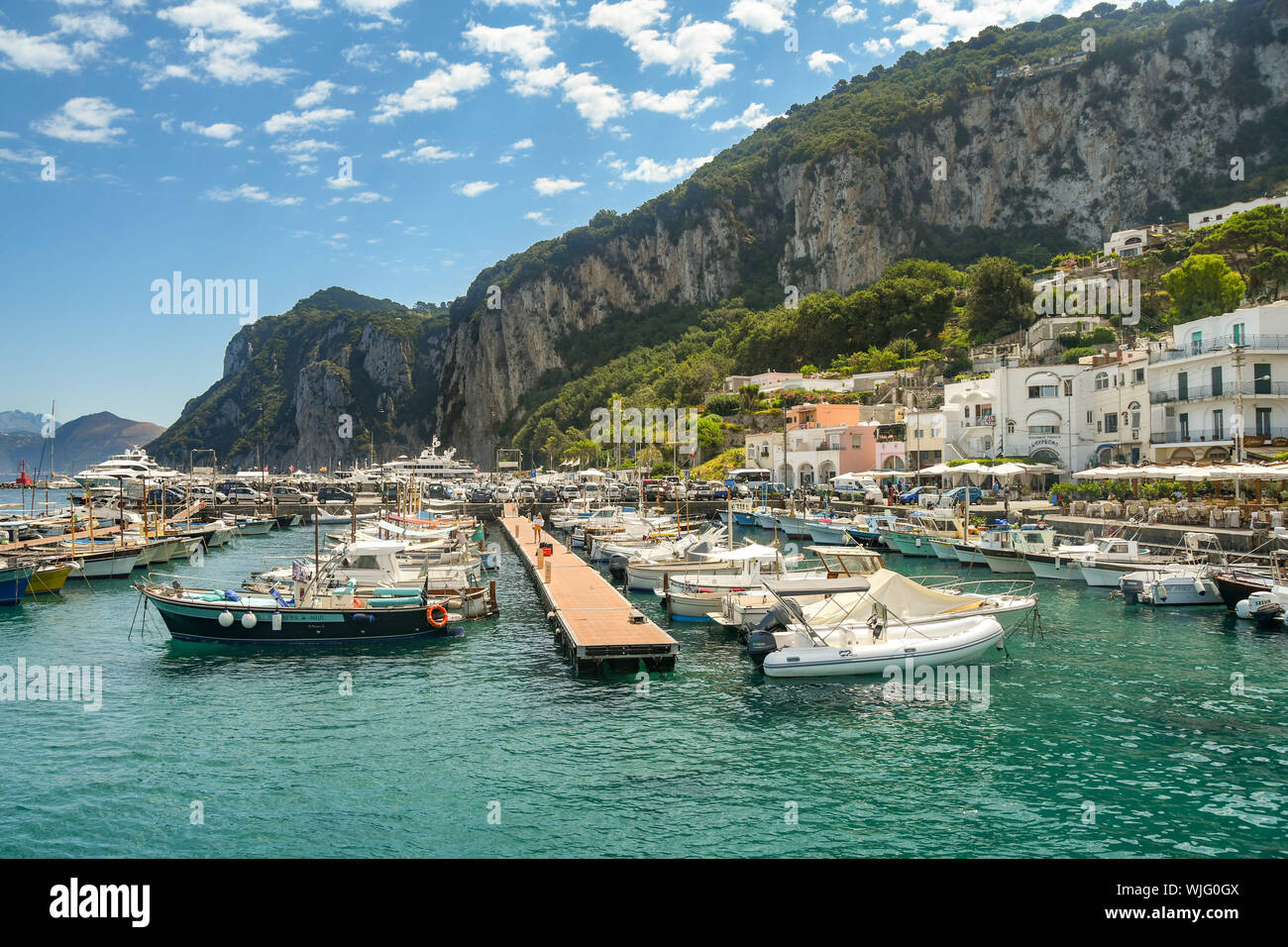 ISLE OF CAPRI, ITALY - AUGUST 2019: Small boats in a marina near the ...