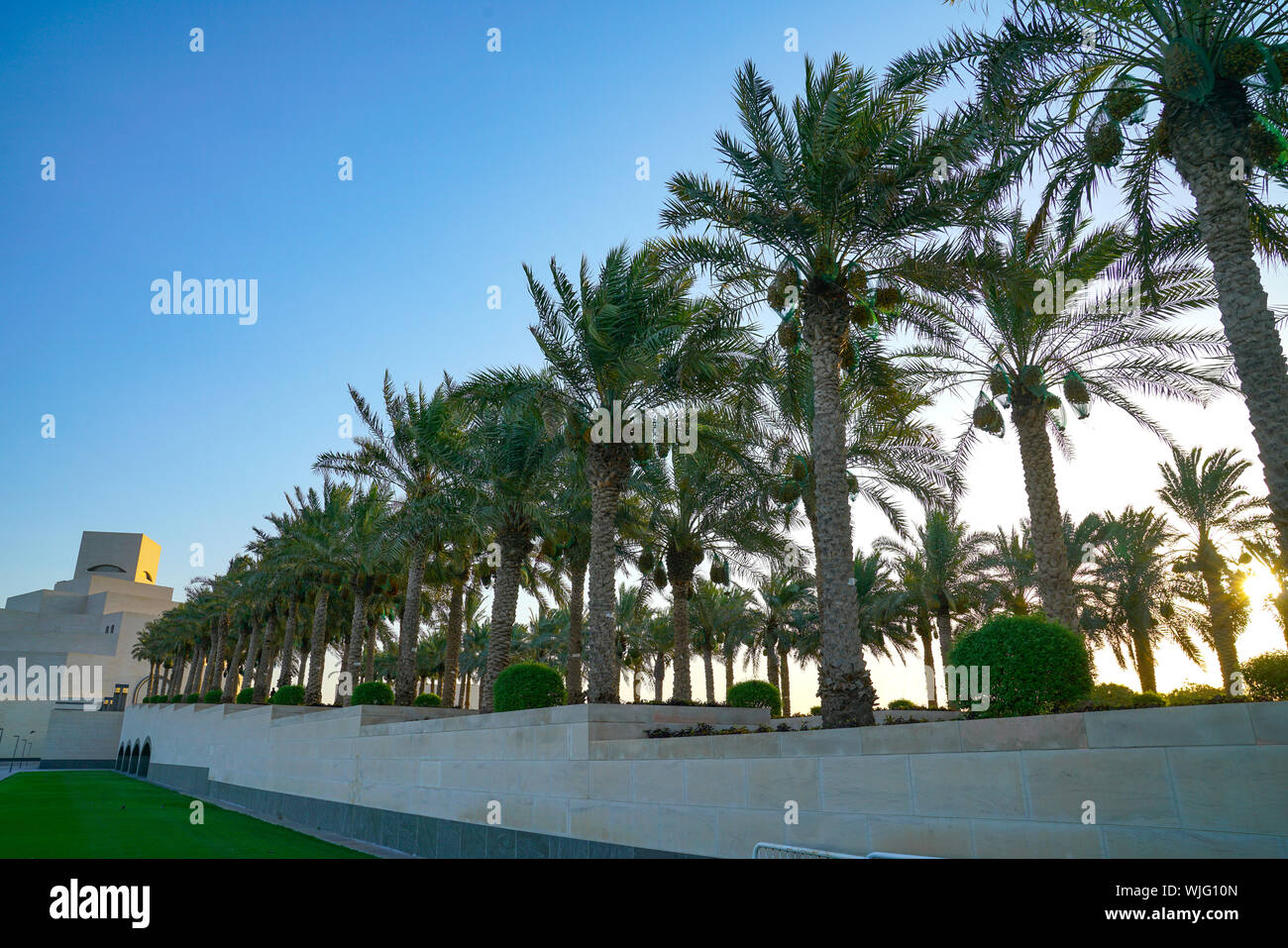 The Corniche on Doha, a pedestrian walkway along harbour edge here with ...