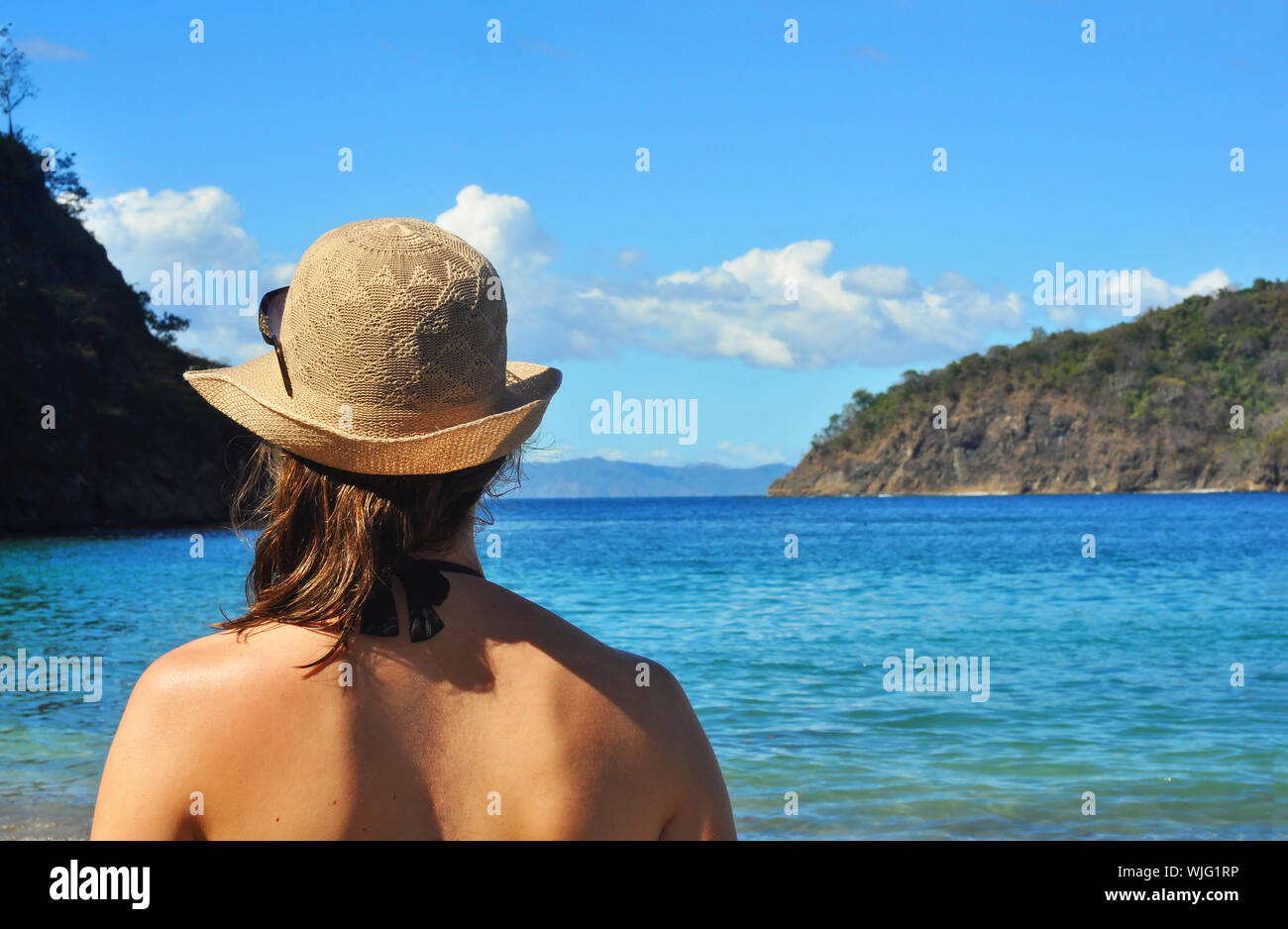 Woman's shoulder and beach hi-res stock photography and images - Alamy