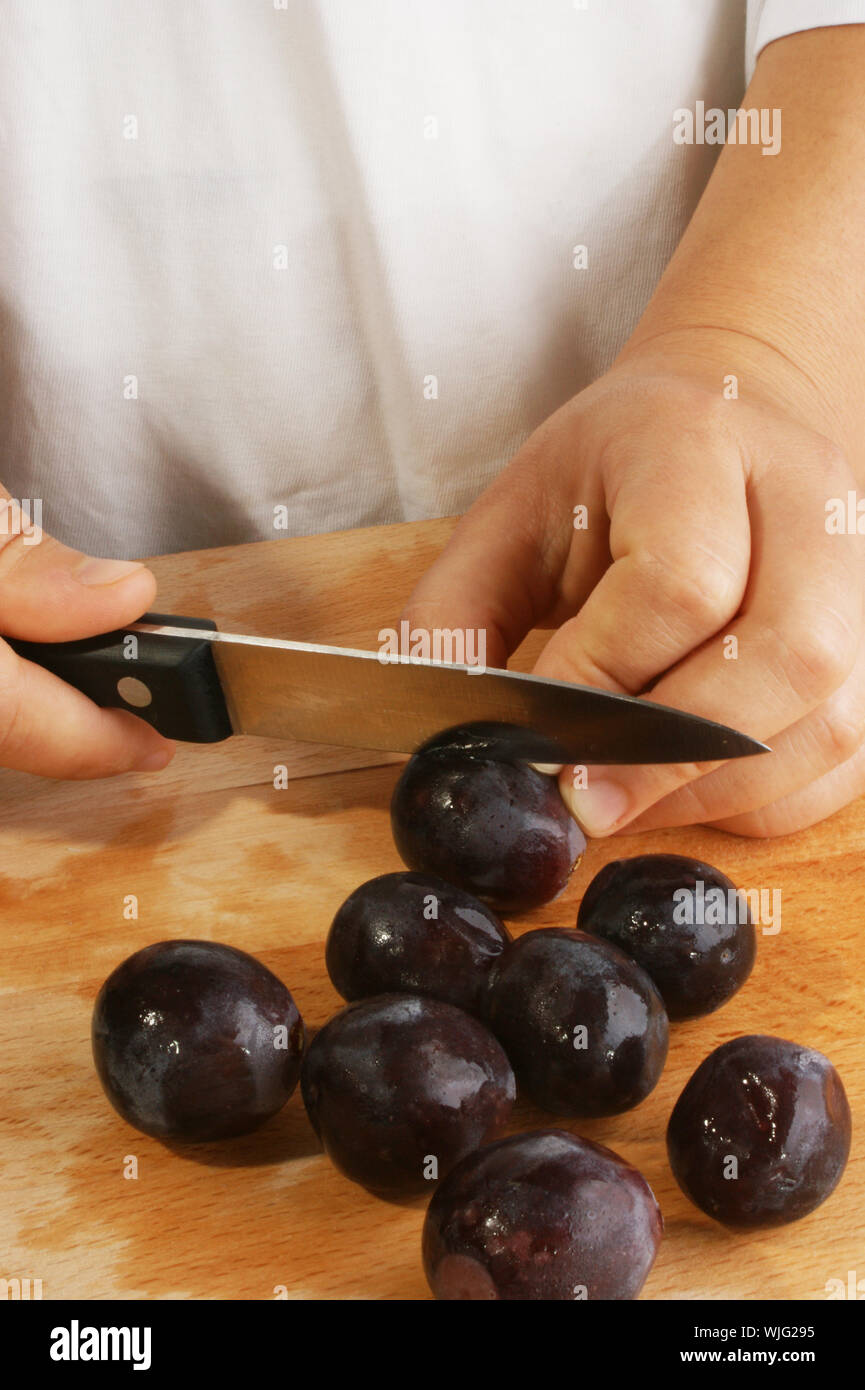 prepare fruit to make a fruitsalad Stock Photo - Alamy