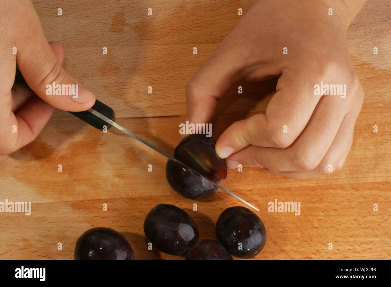 prepare fruit to make a fruitsalad Stock Photo - Alamy