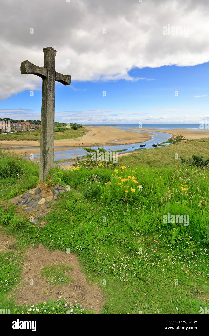 St Cuthberts Cross on Church Hill overlooking the River Aln estuary and ...